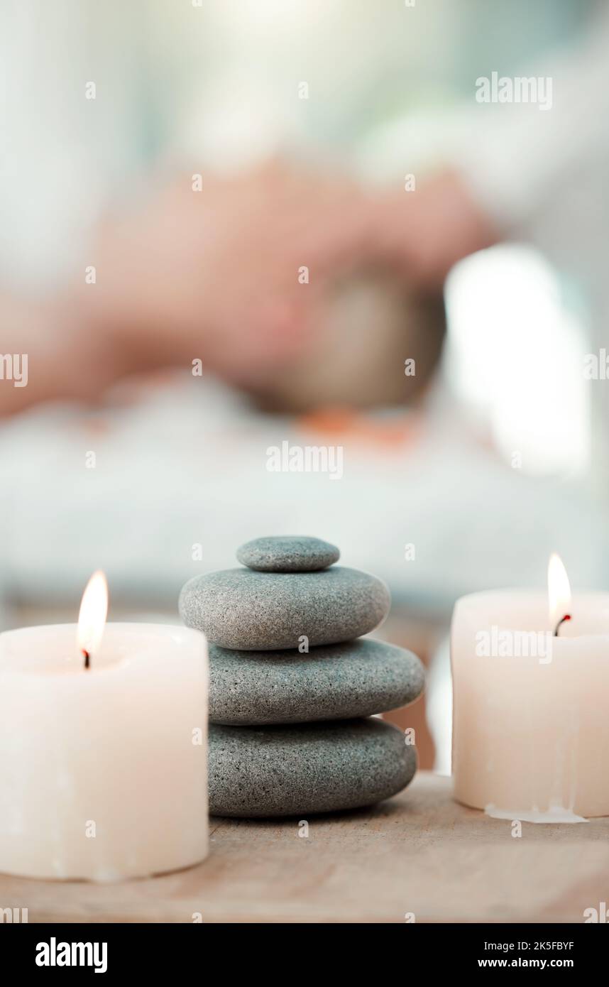 Spa, rock and candle to relax in a room with atmosphere, mood or ...