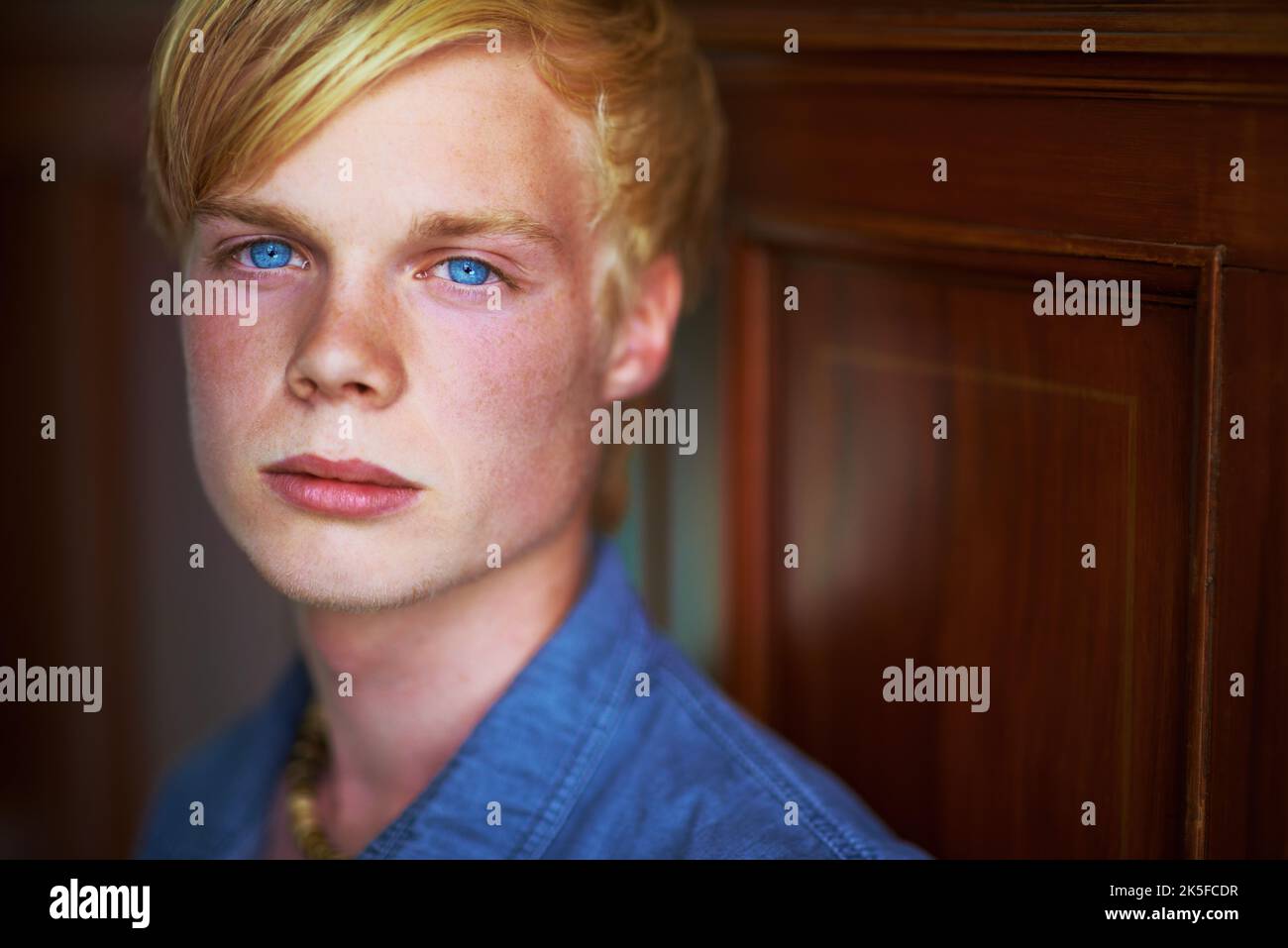 Nordic good looks. Thoughtful and handsome young blonde guy with very ...