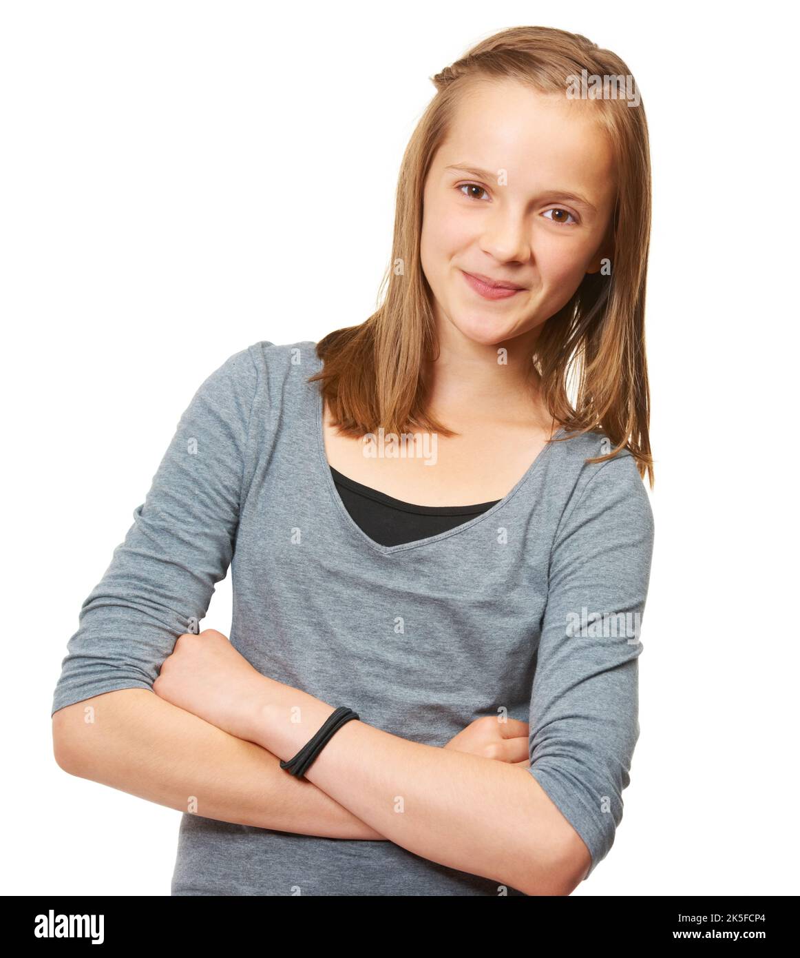 Shes a sweetheart. Studio portrait of a young teenage girl standing ...
