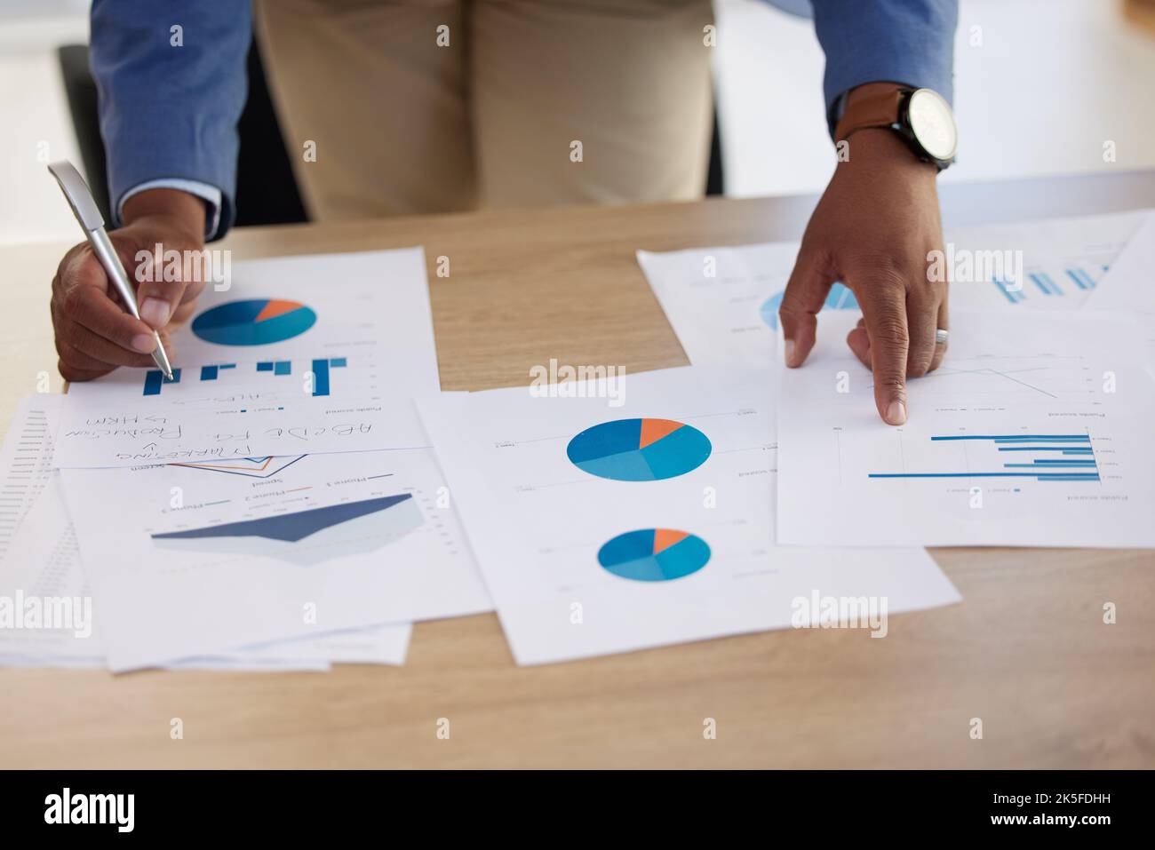 Businessman hands, paperwork graphs and planning annual report, data ...