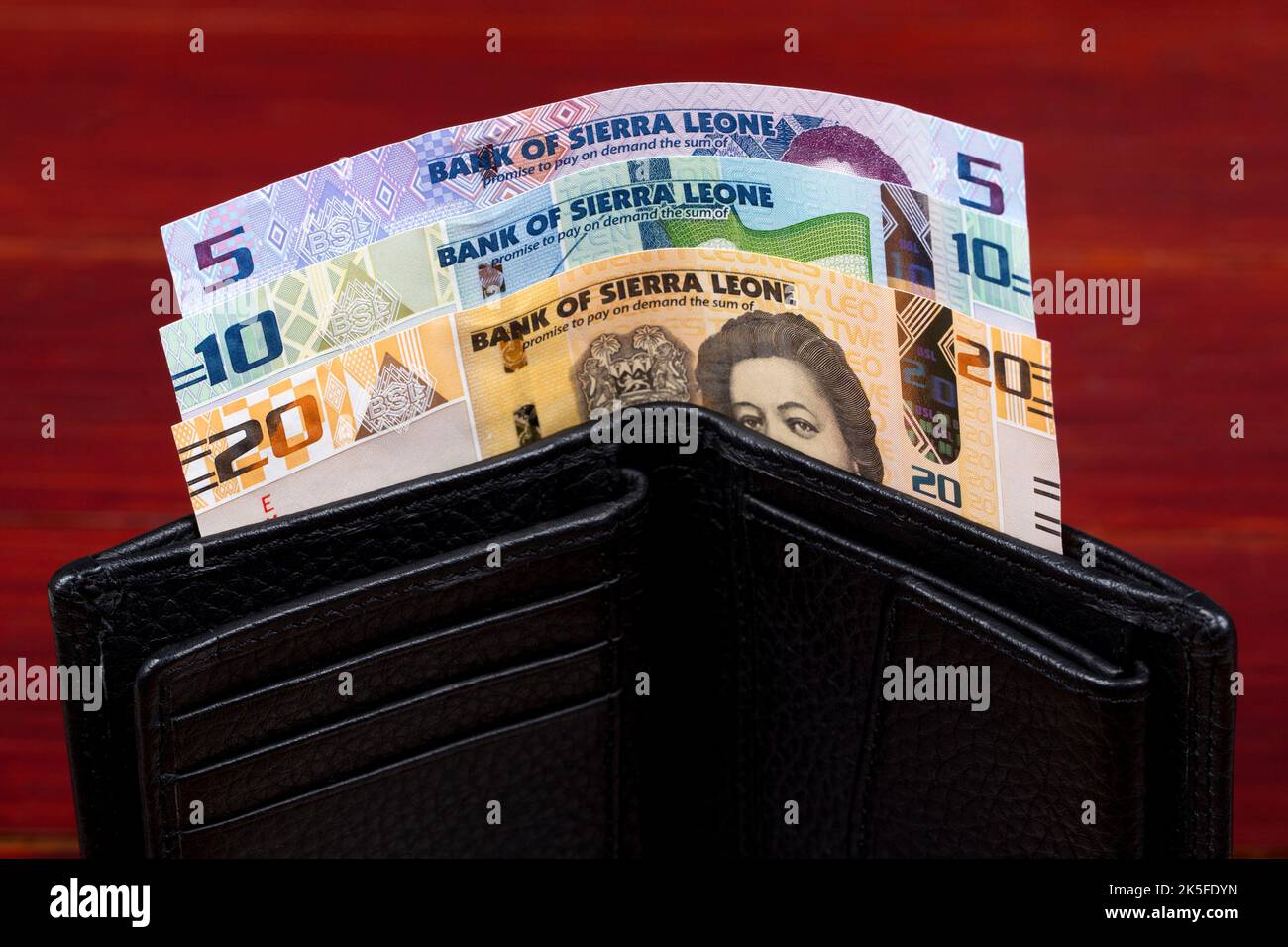 Sierra Leonean money - Leones in the black wallet Stock Photo - Alamy
