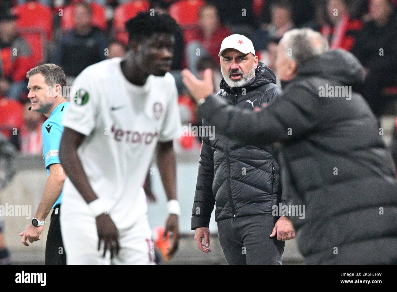 Head coach of Slavia Jindrich Trpisovsky, center, is seen during the ...