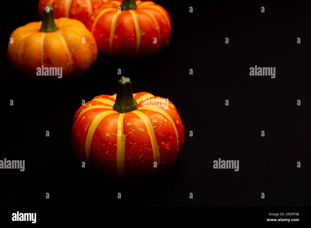 Halloween decorations concept, Scary smiling pumpkin on black ...
