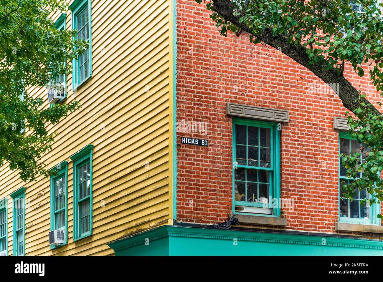 Texture of yellow and red colorful building exteriors in Hicks Street ...