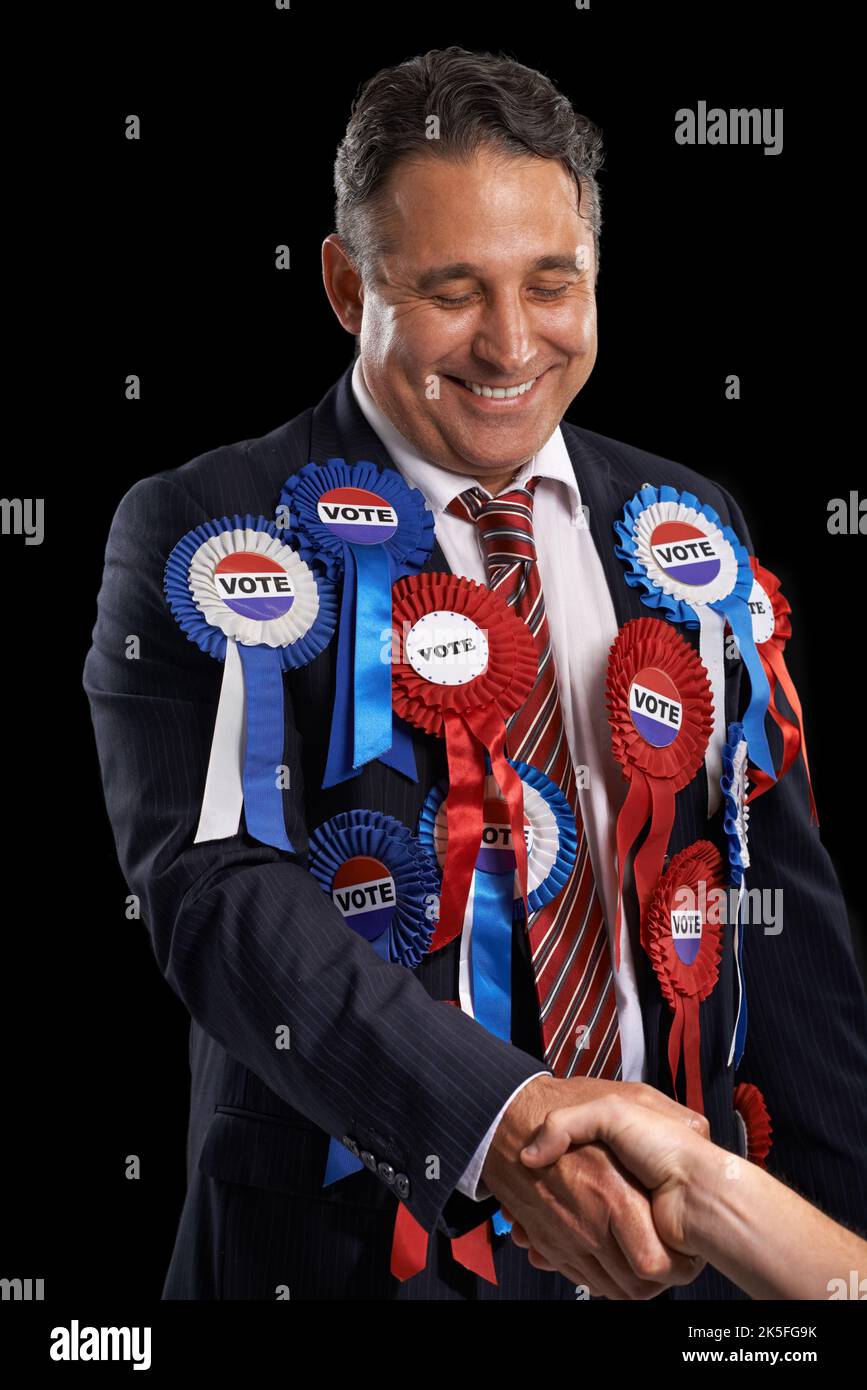 Meet and greet. A friendly politician greeting a voter with a handshake ...