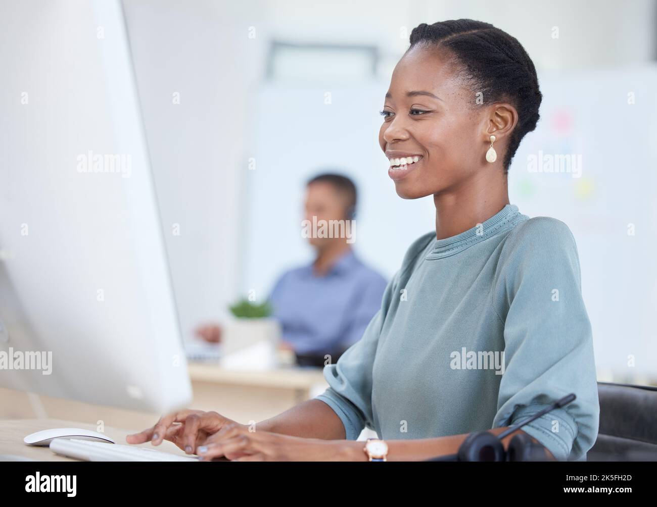 Employee, business woman and computer working in a startup office ...