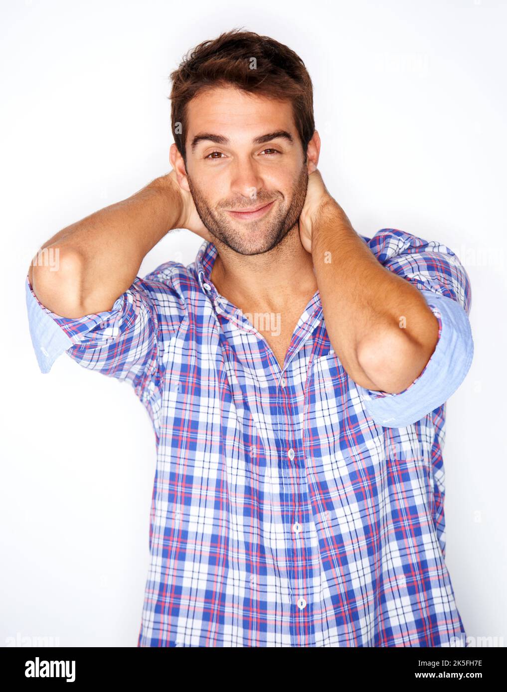 Casual and gorgeous modern man. Handsome young guy in a check shirt ...