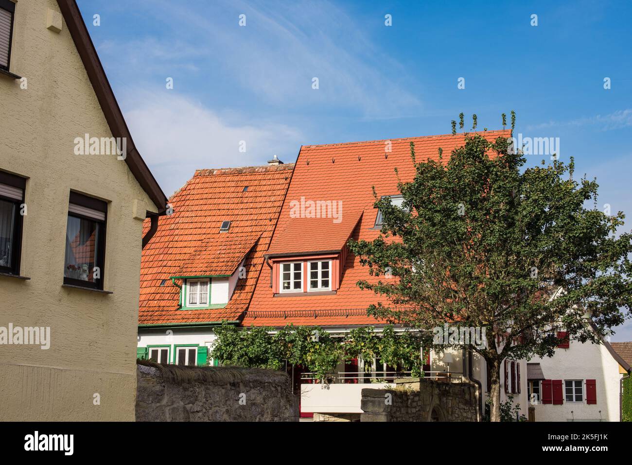 Traditional small house with beautiful outdoor decor facade in Germany ...