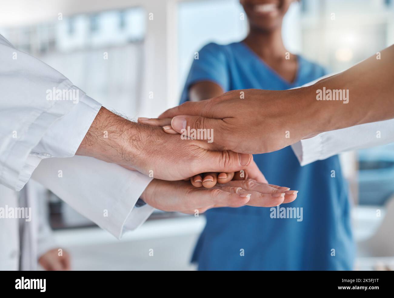 Medical motivation, doctor success and hands of team of hospital workers stacked for healthcare ...