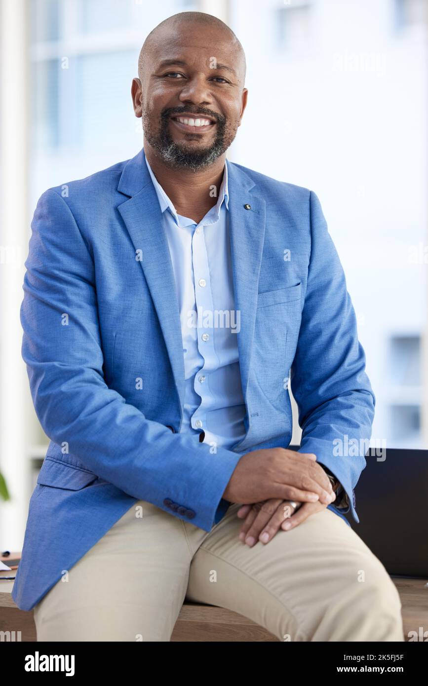 Black man, entrepreneur and businessman success in a office with proud ...