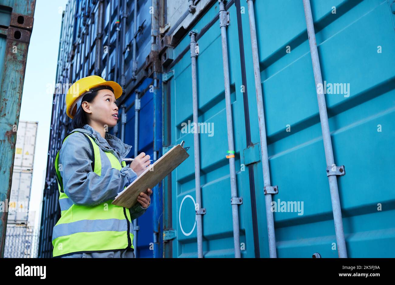 Storage shipping container, cargo worker and logistic woman employee ...