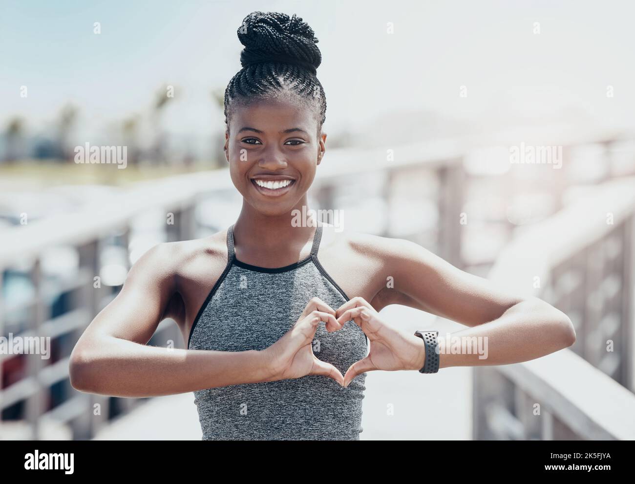 Black woman, fitness and portrait heart gesture for healthy exercise ...