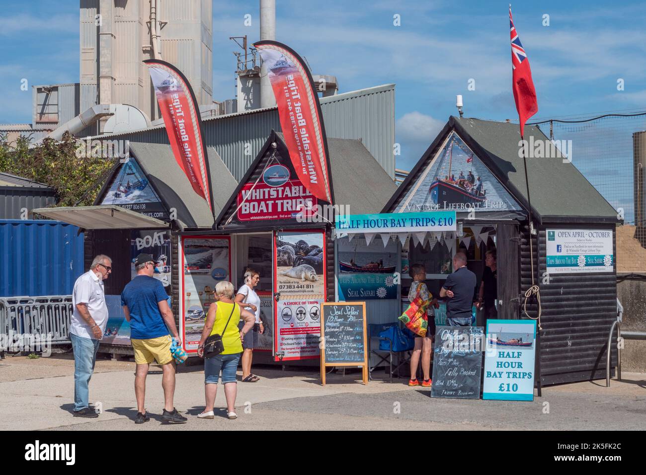 General view of tour boat tour booths in Whitstable Harbour, Whitstable ...