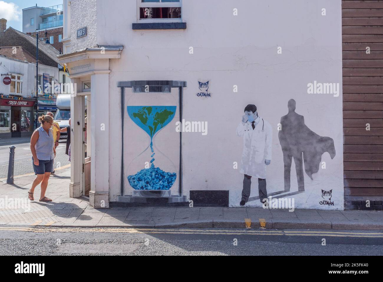 "Wasted Time" depicts an hourglass of plastic.. Catman street art, part ...