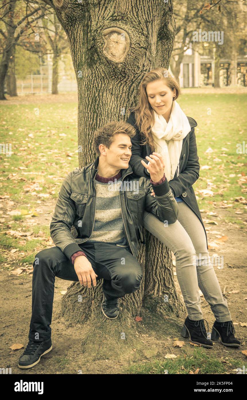 Modern fashion hipster couple of young lovers with autumn clothes ...