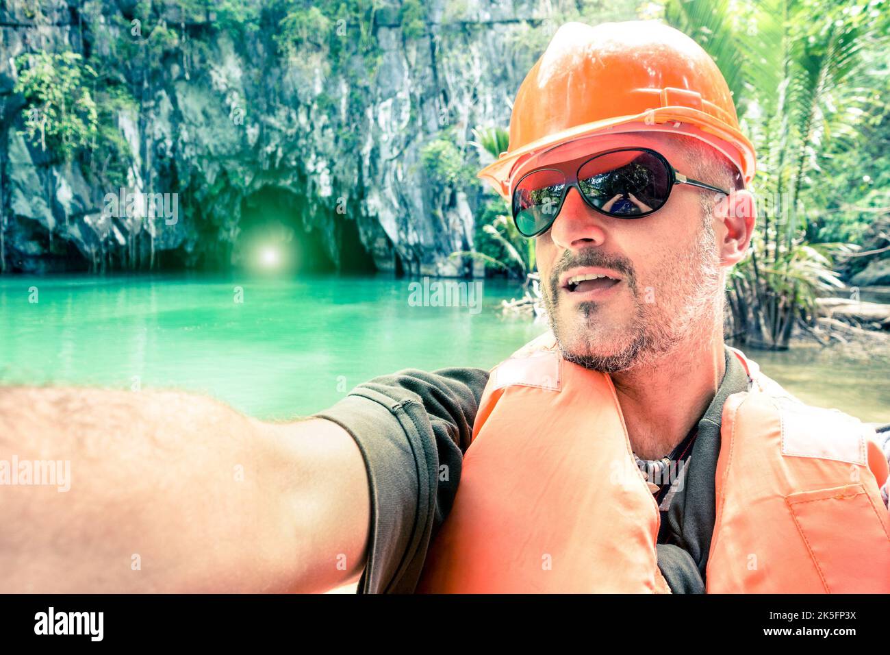 Handsome man taking selfie at " Puerto Princesa " underground river ...