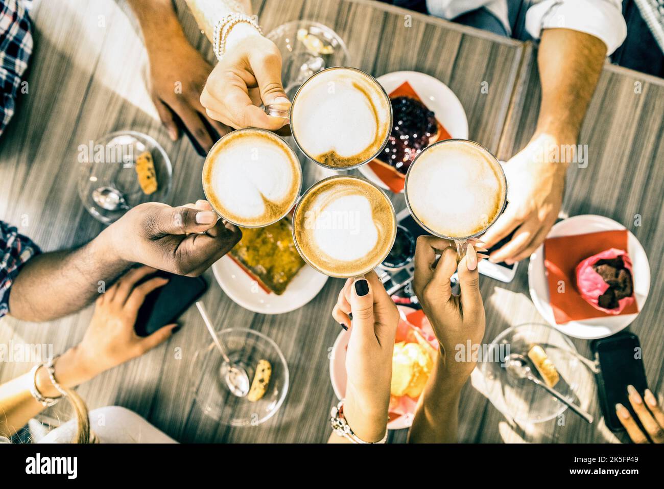Friends group drinking cappuccino at coffee bar restaurant - People ...
