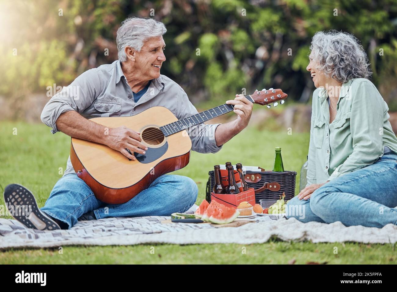 Retirement, love and guitar with couple on picnic in park together for ...