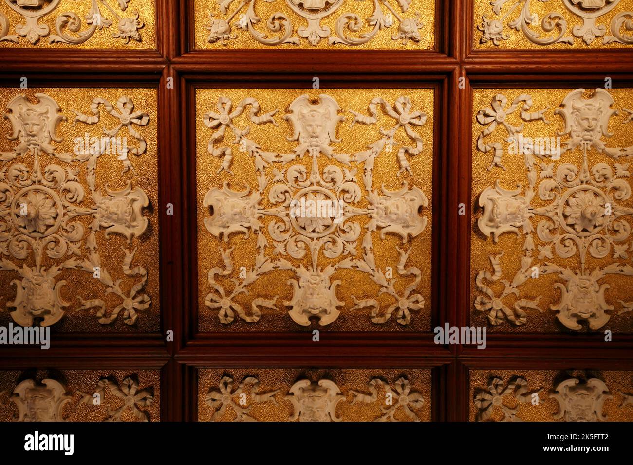 Ornate decorative plaster work ceiling in the Ballroom at Bletchley ...