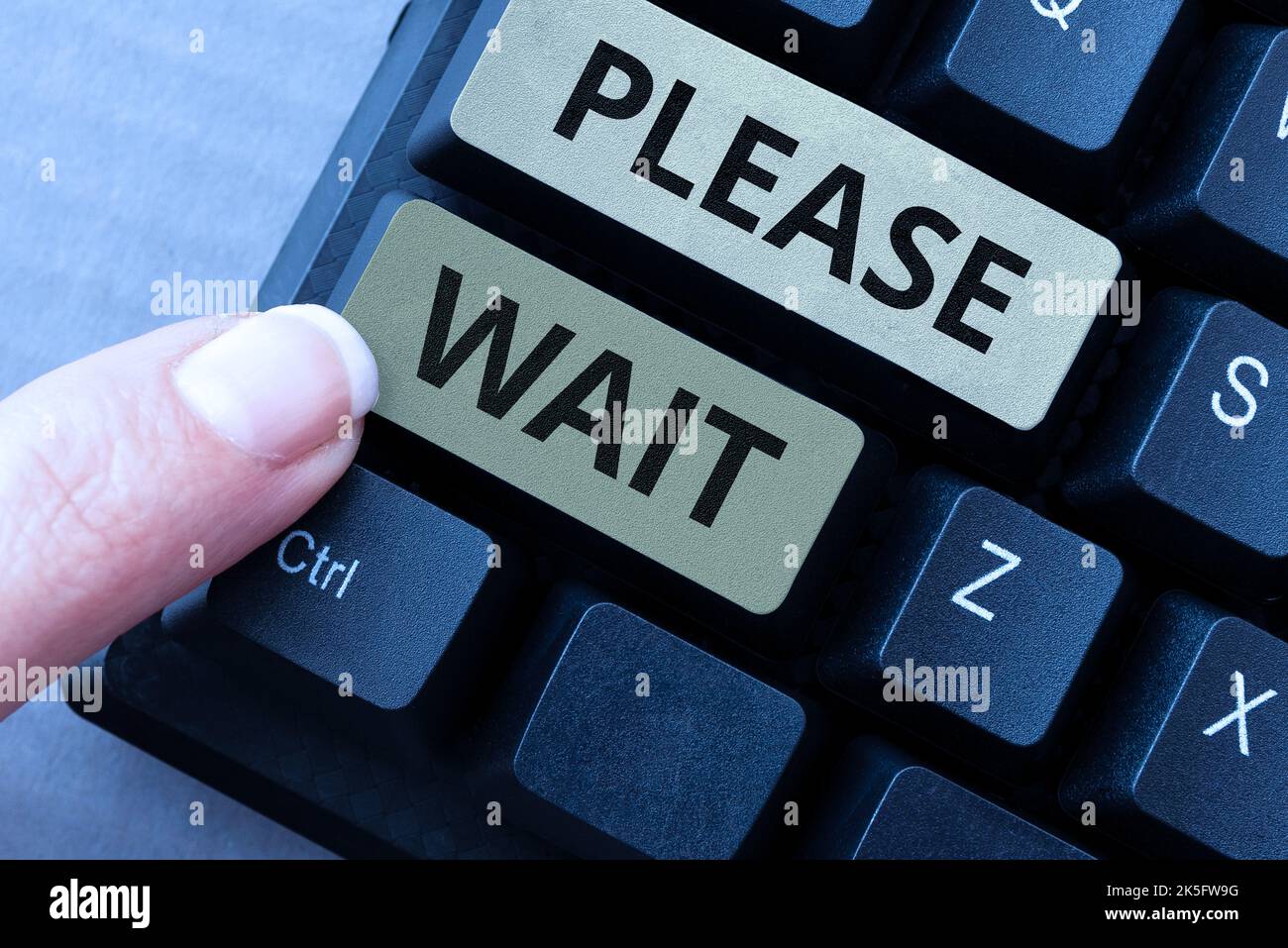 Conceptual display Please Wait. Word Written on to pause any implemented action immediately and ...