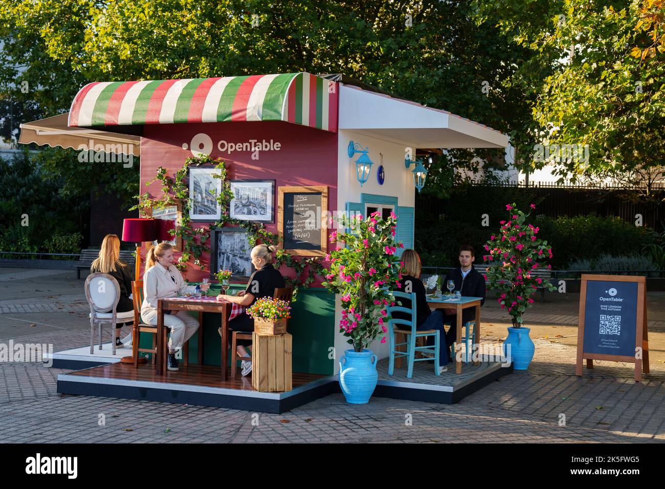 EDITORIAL USE ONLY Diners at OpenTable's pop-up. The pop-up launches as part of OpenTable's ...