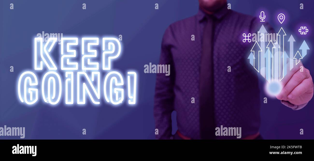 Conceptual caption Keep Going. Business concept to continue living ...