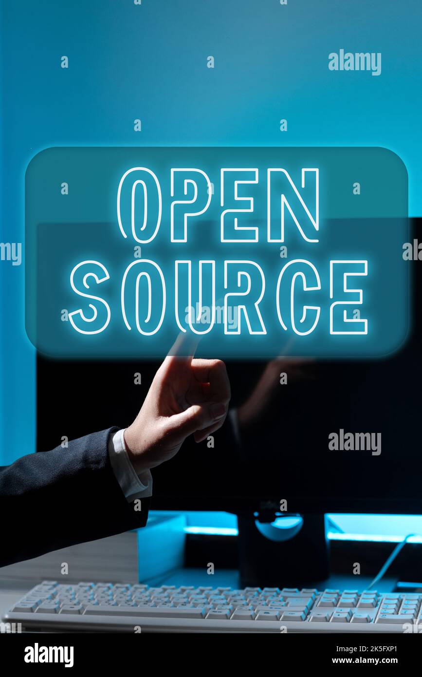 Text sign showing Open Source. Word Written on contains the source code that can be modified and ...