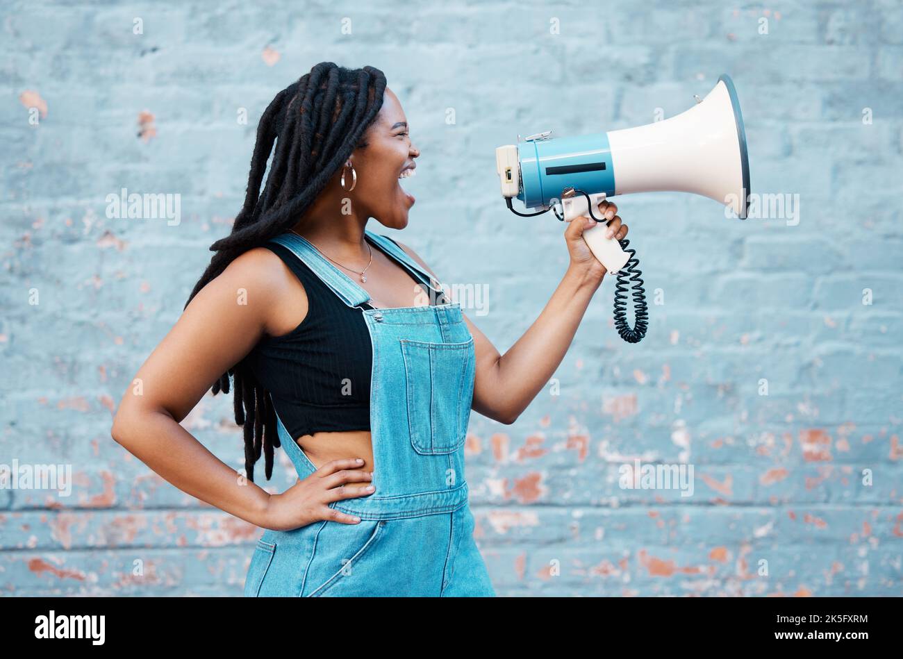 Megaphone, protest and black woman with speech, rally and announcement ...