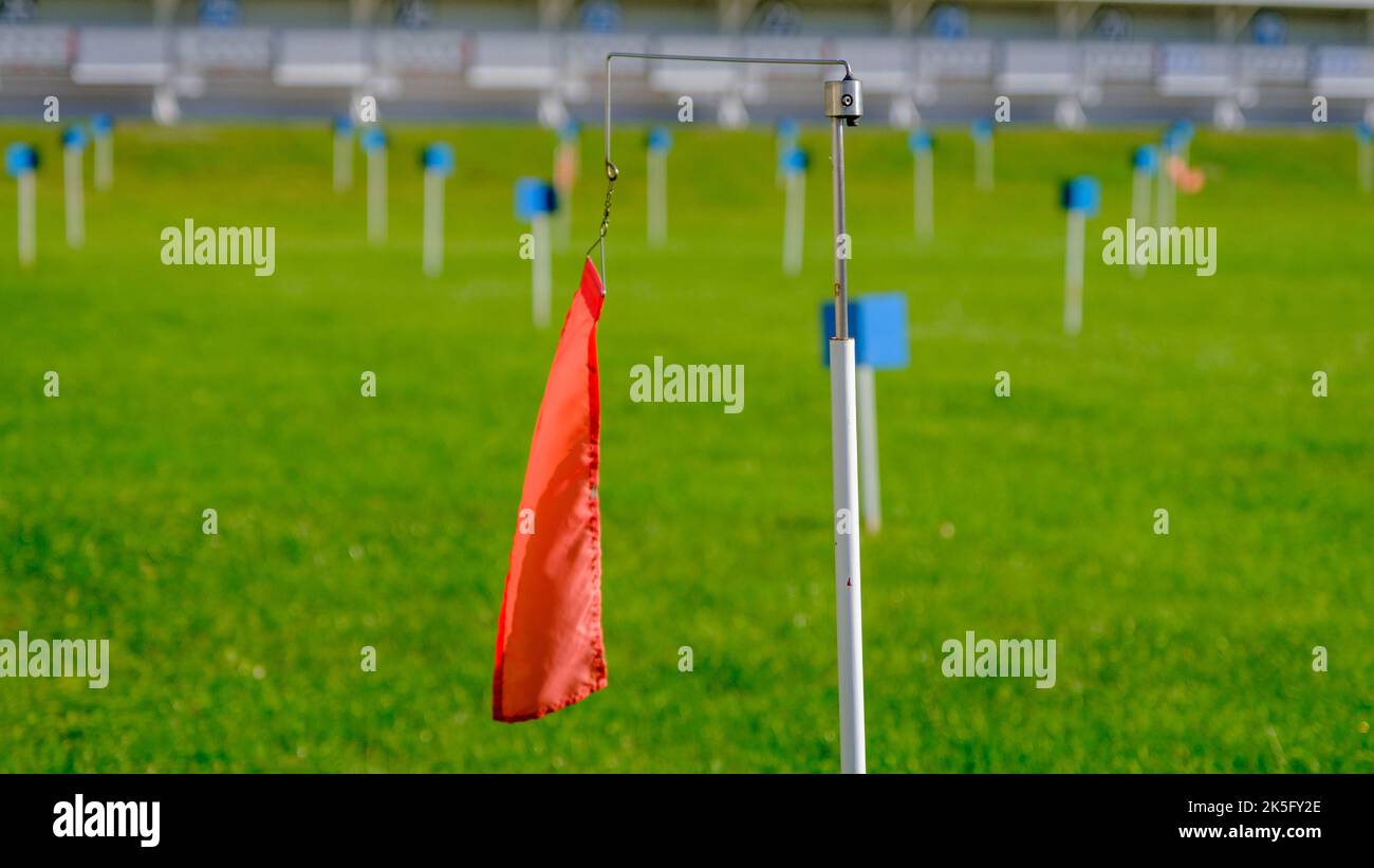 red wind direction flag biathlon shooting range. outdoor in the summer ...