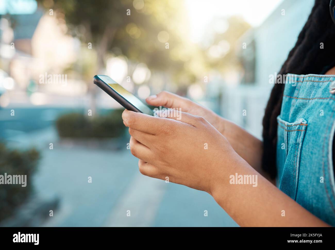 Black woman, hands and phone in city travel with gps location tracking ...