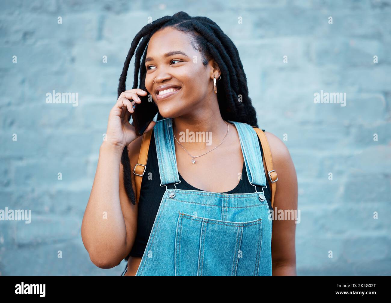 Happy black woman, phone call and smile in communication, talking and ...