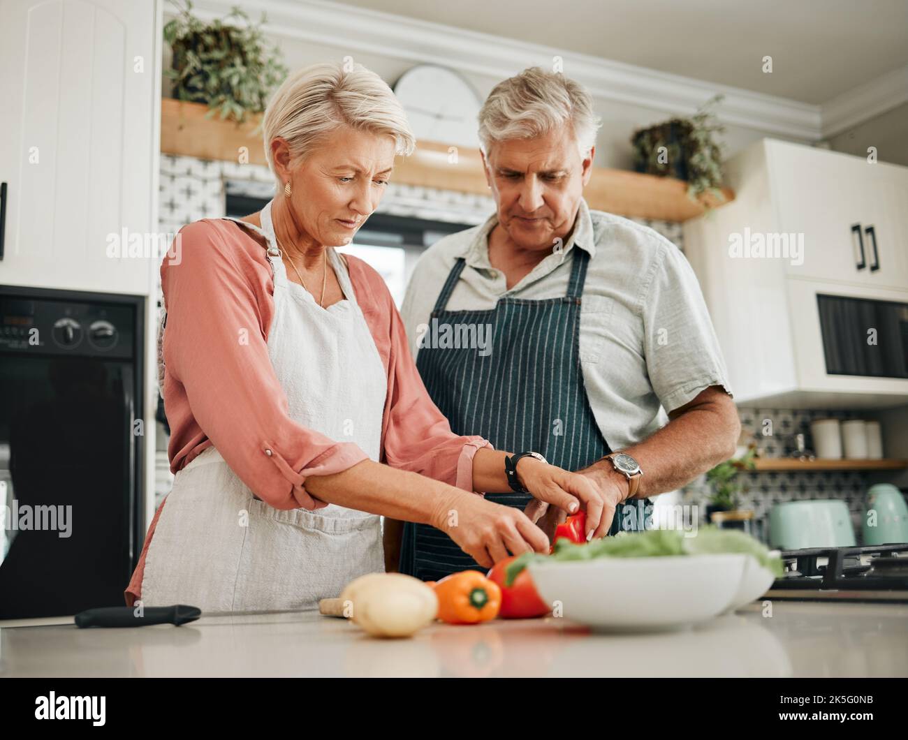 Woman elderly food vegetables kitchen hi-res stock photography and ...