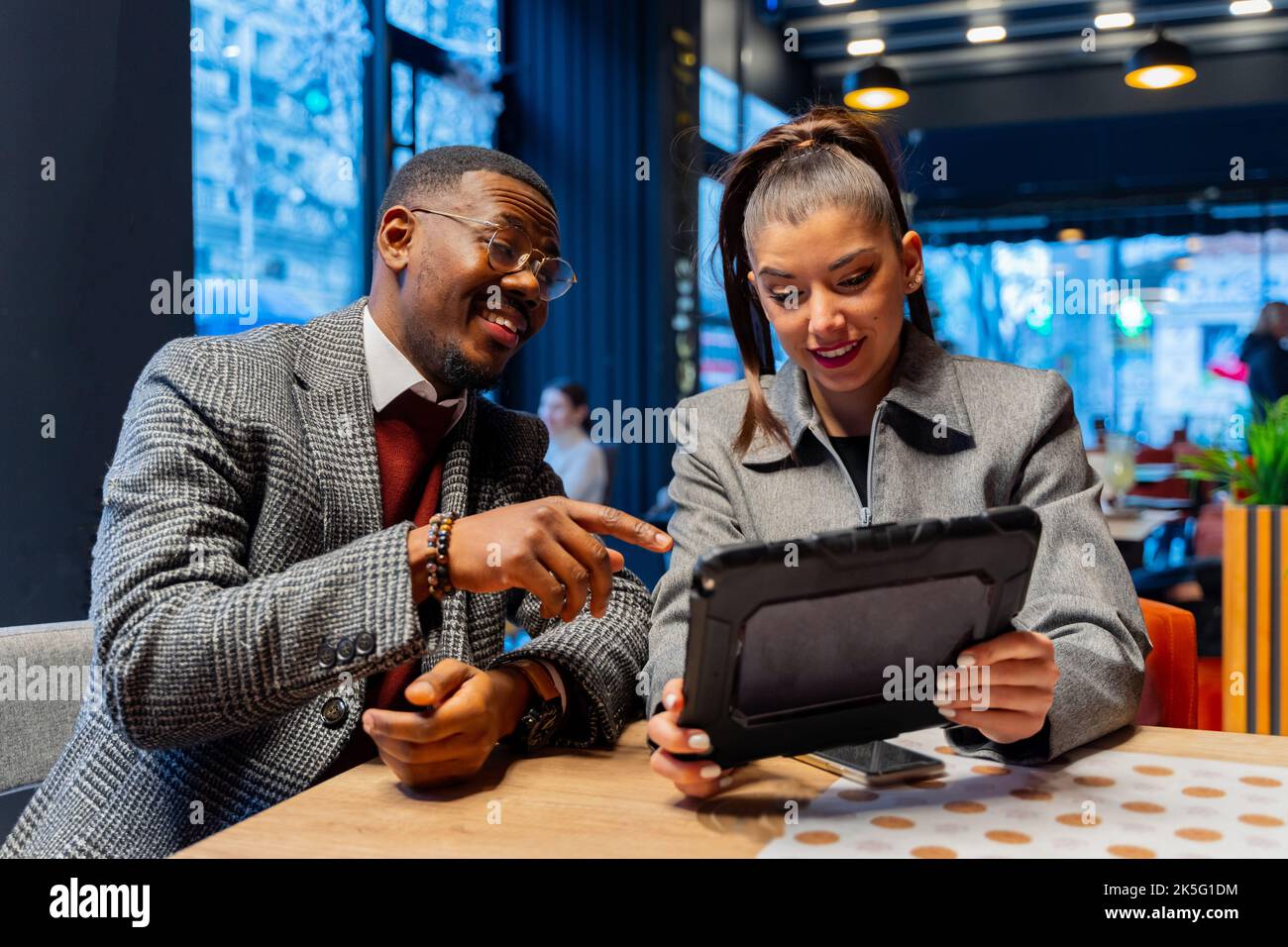 Multiracial discussing work plans hi-res stock photography and images ...
