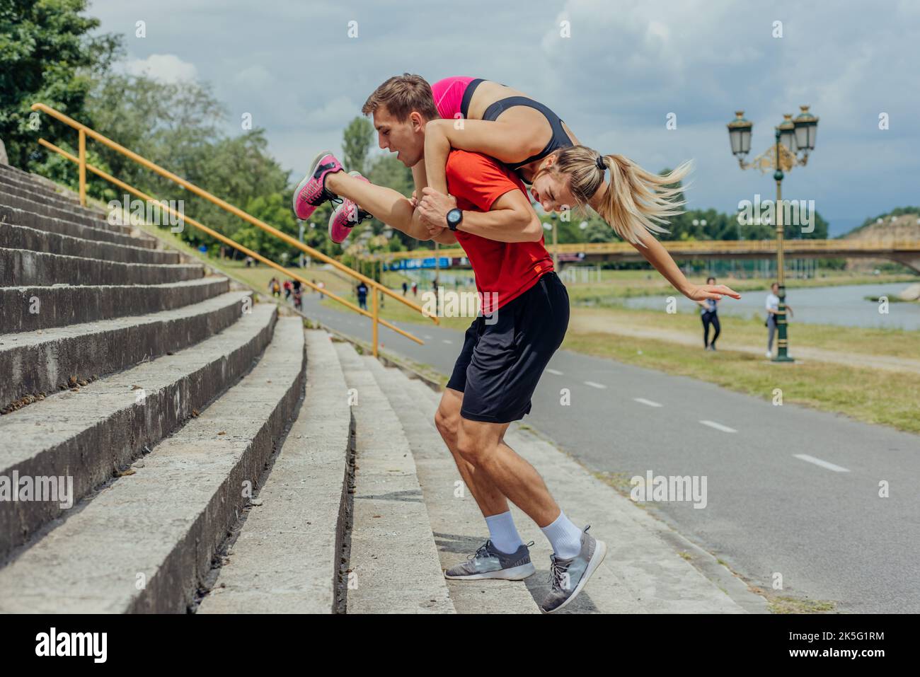 Running up steps heavy hi-res stock photography and images - Alamy