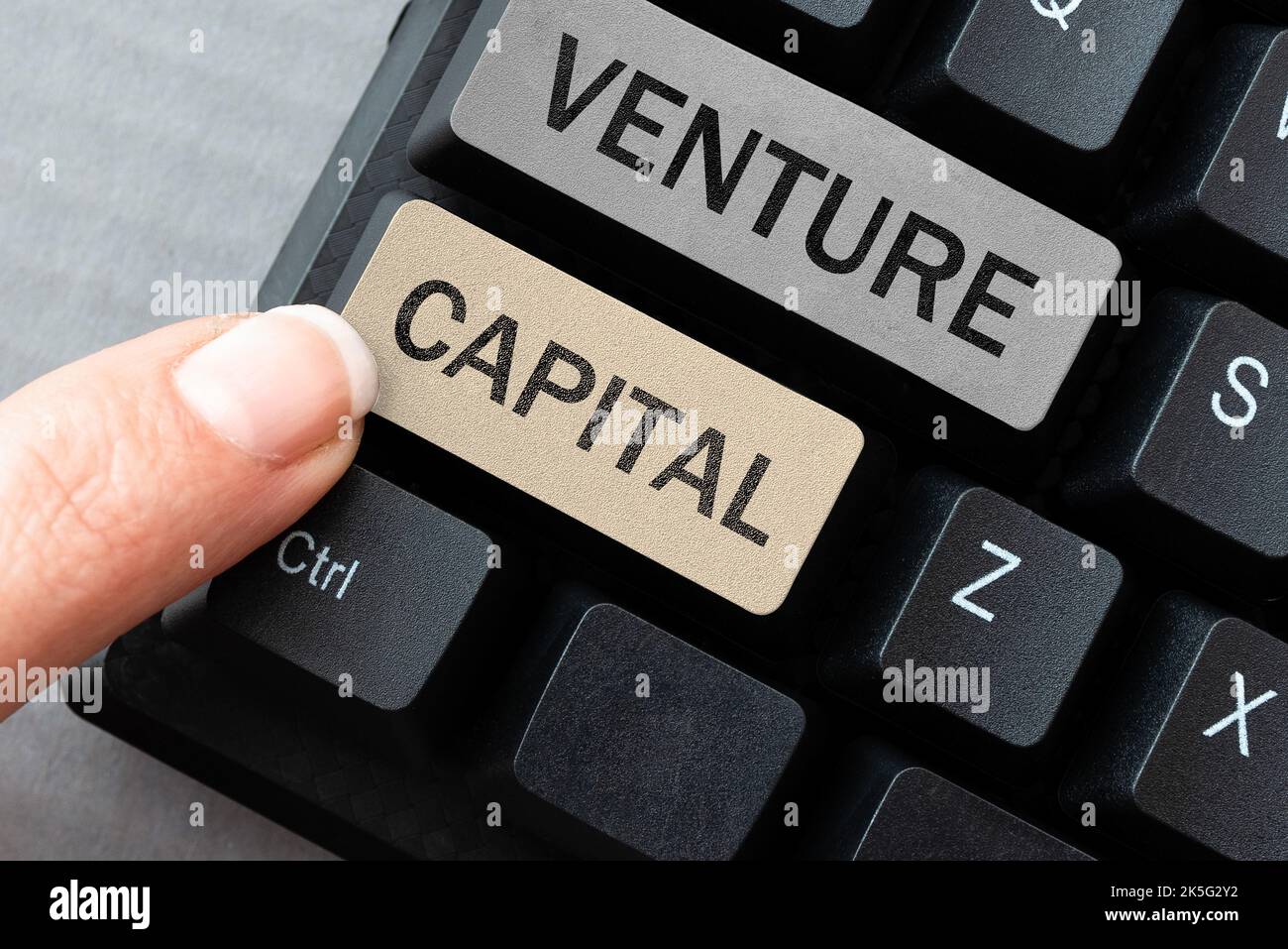 Hand writing sign Venture Capital. Business overview available for ...