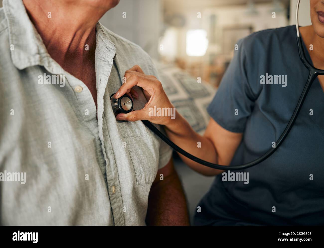 Doctor, hand and stethoscope of senior care in heart rate check ...