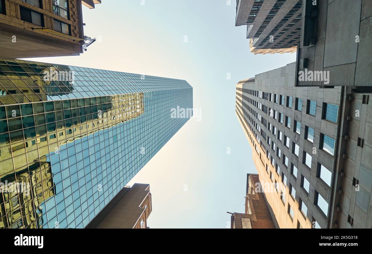 Big city buildings seen from below at midday Stock Photo - Alamy