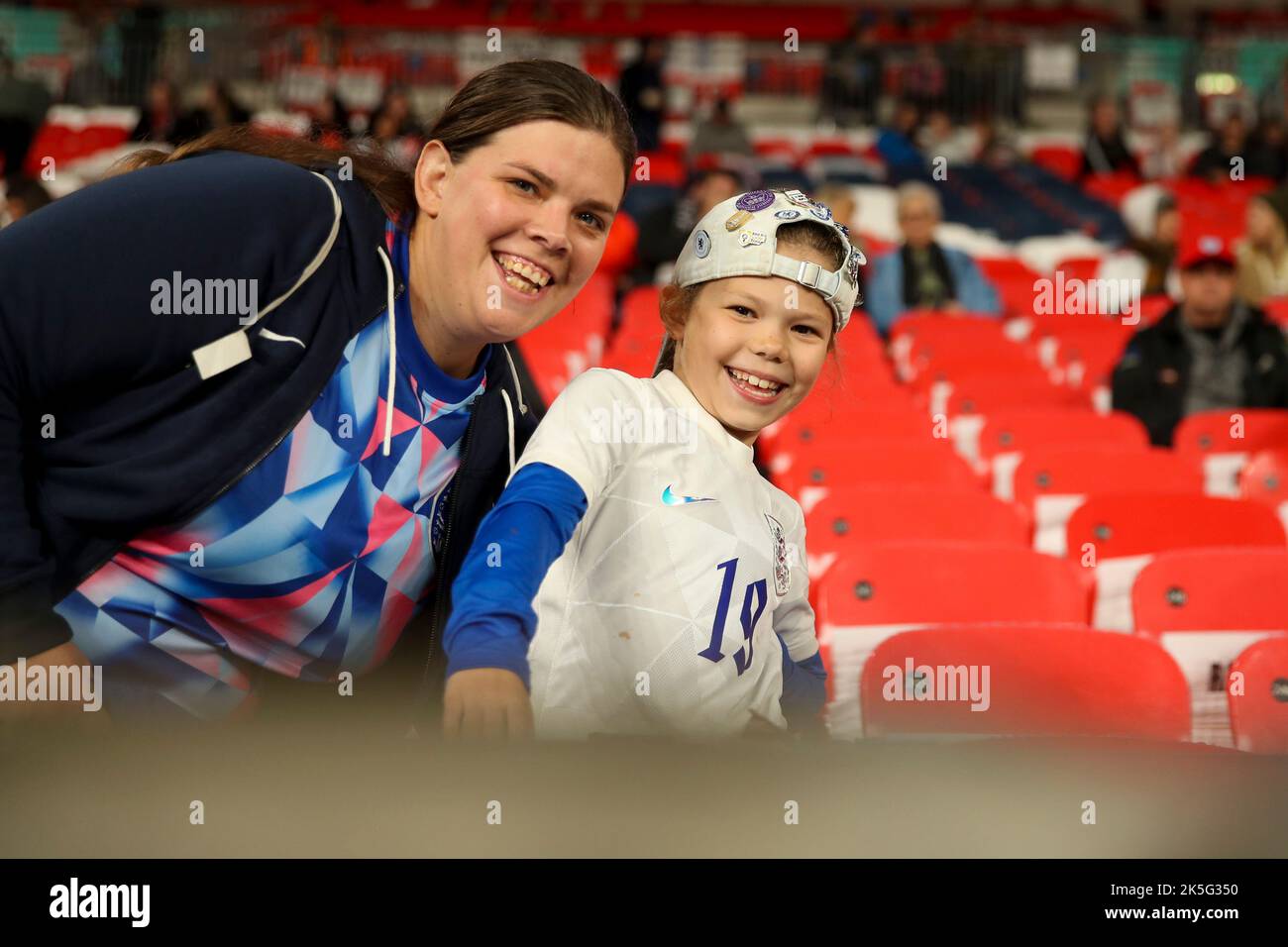 A young fan with their mum during the International Friendly match ...