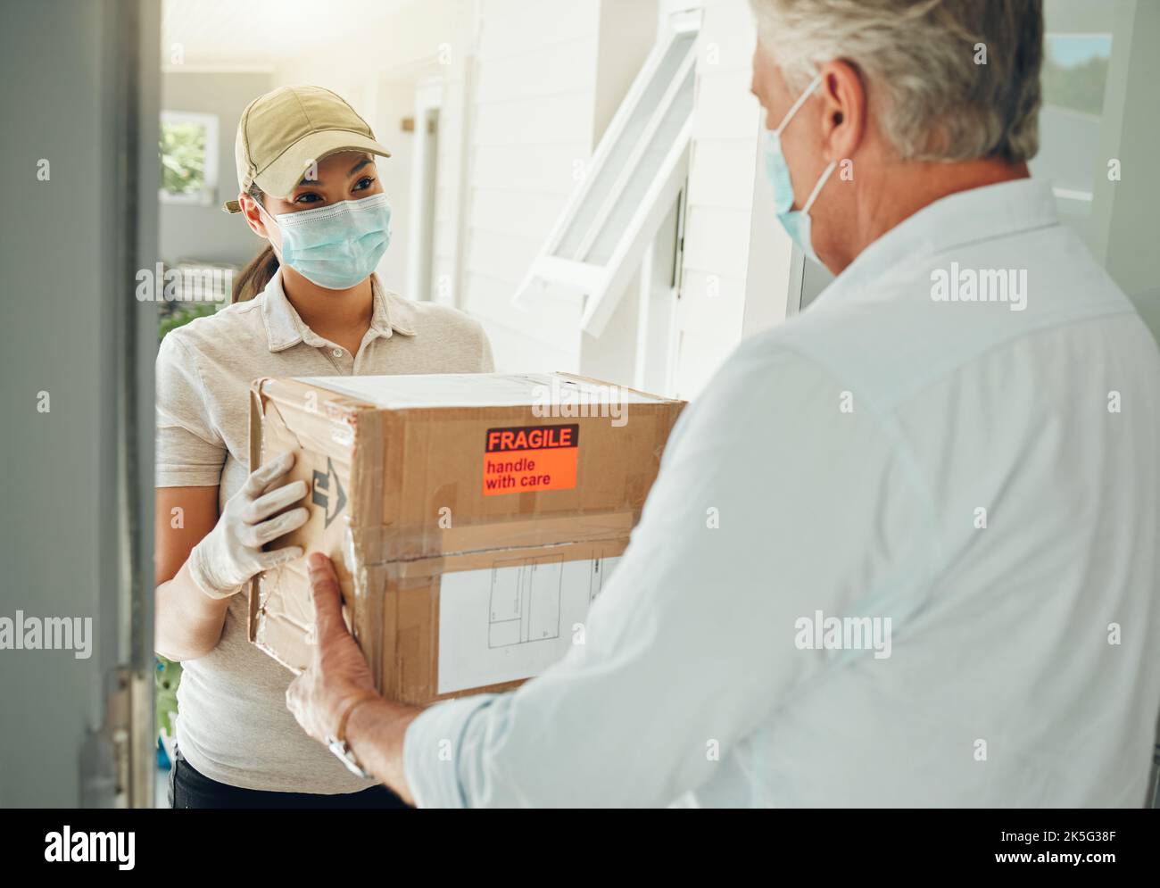 Online delivery worker, during covid pandemic does ecommerce box ...