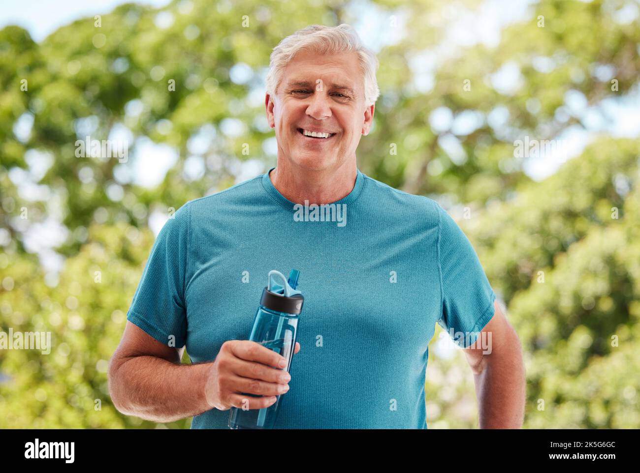 Fitness, garden and a senior man with water bottle, exercise and ...