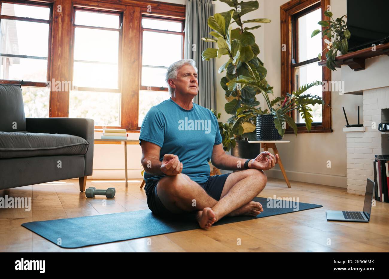 Senior man, yoga meditation and home workout in lotus pose for fitness ...