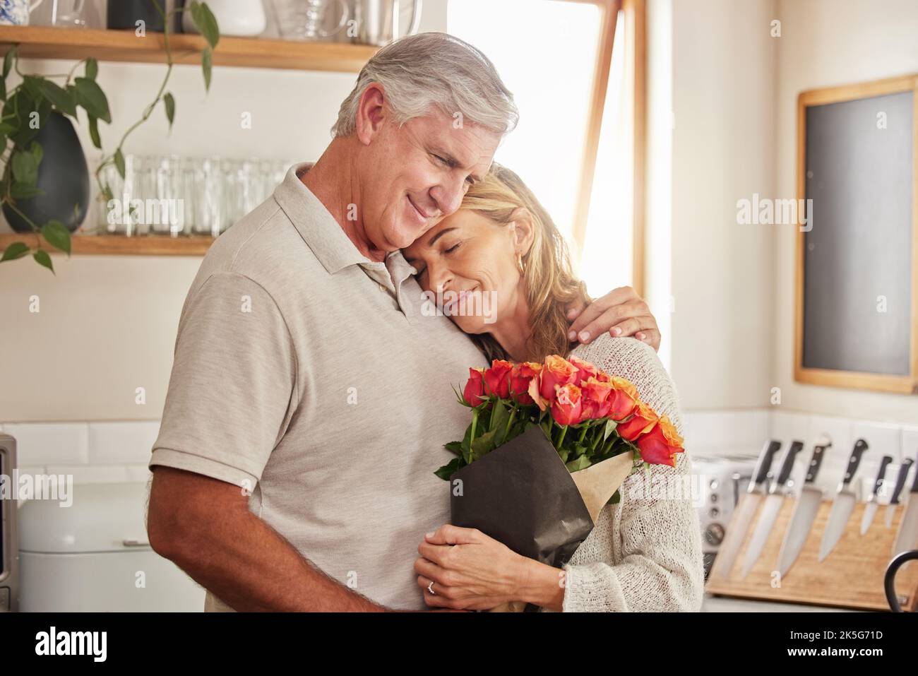 Flower bouquet, hug and senior couple in celebration of love, marriage ...