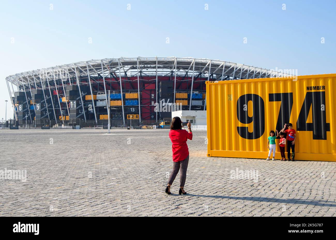 Doha, Qatar. 7th Oct, 2022. People take photos in front of the Stadium ...