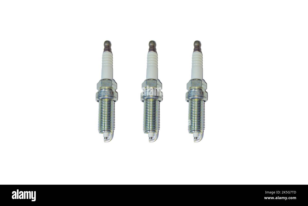 close up photo of spark plug parts for gasoline fueled cars on white ...
