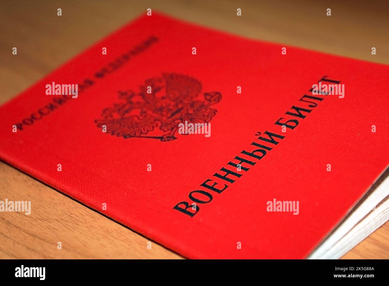 A close up of a Russian military ID on a desk translated: Russian ...