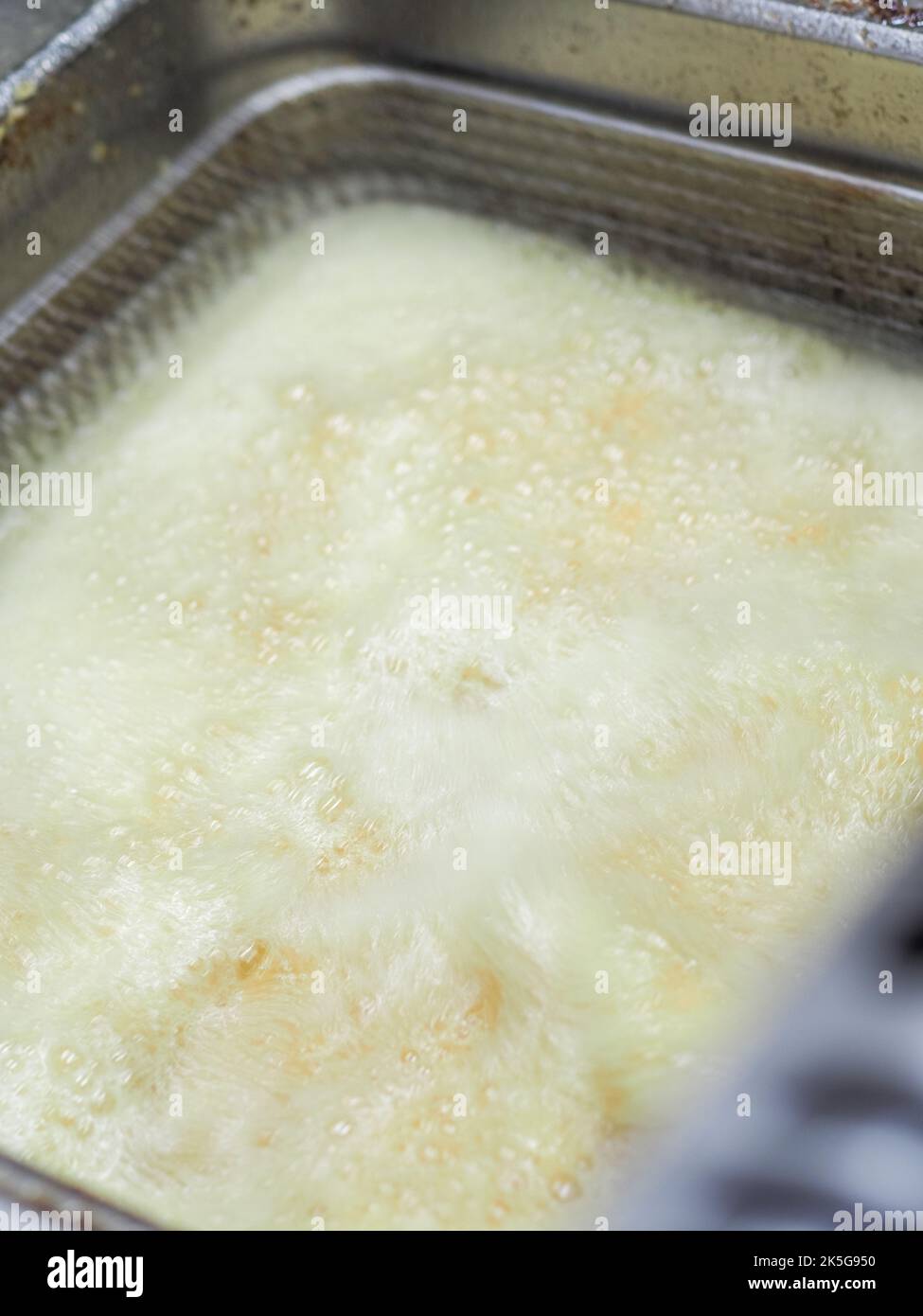 frying french fries in kitchen Stock Photo - Alamy