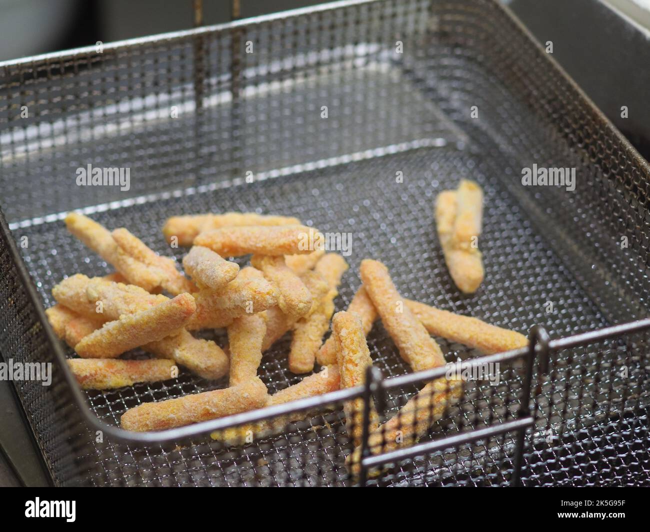 frying french fries in kitchen Stock Photo - Alamy