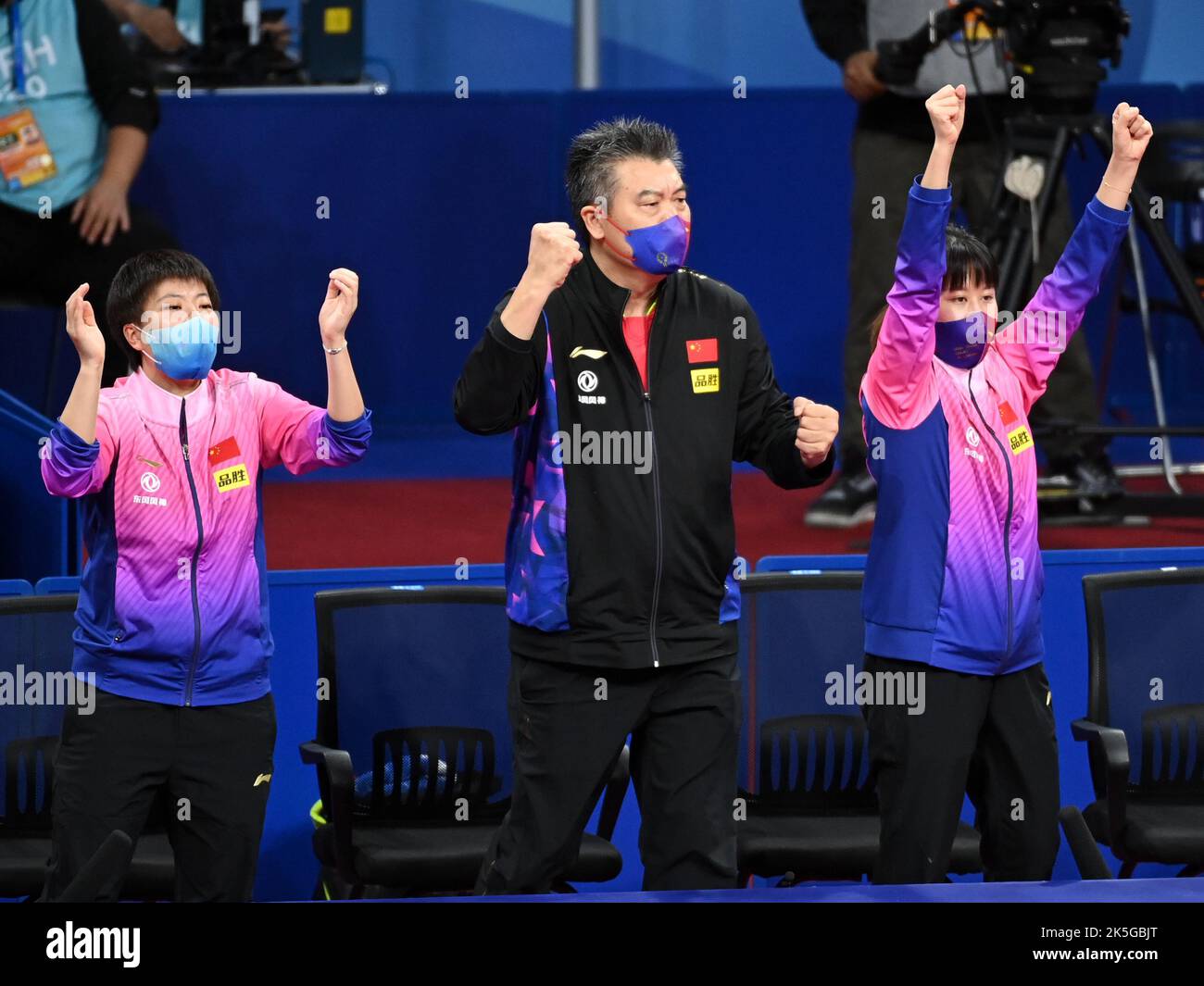 Chengdu, China's Sichuan Province. 8th Oct, 2022. Wang Yidi, coach Li Sun and Chen Xingtong (L ...