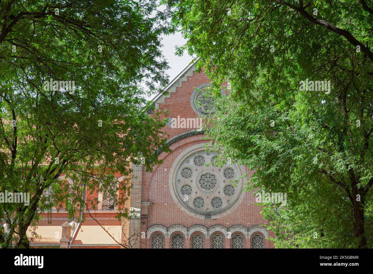 Antique vietnamese window with decoration pattern on bricks wall hidden ...