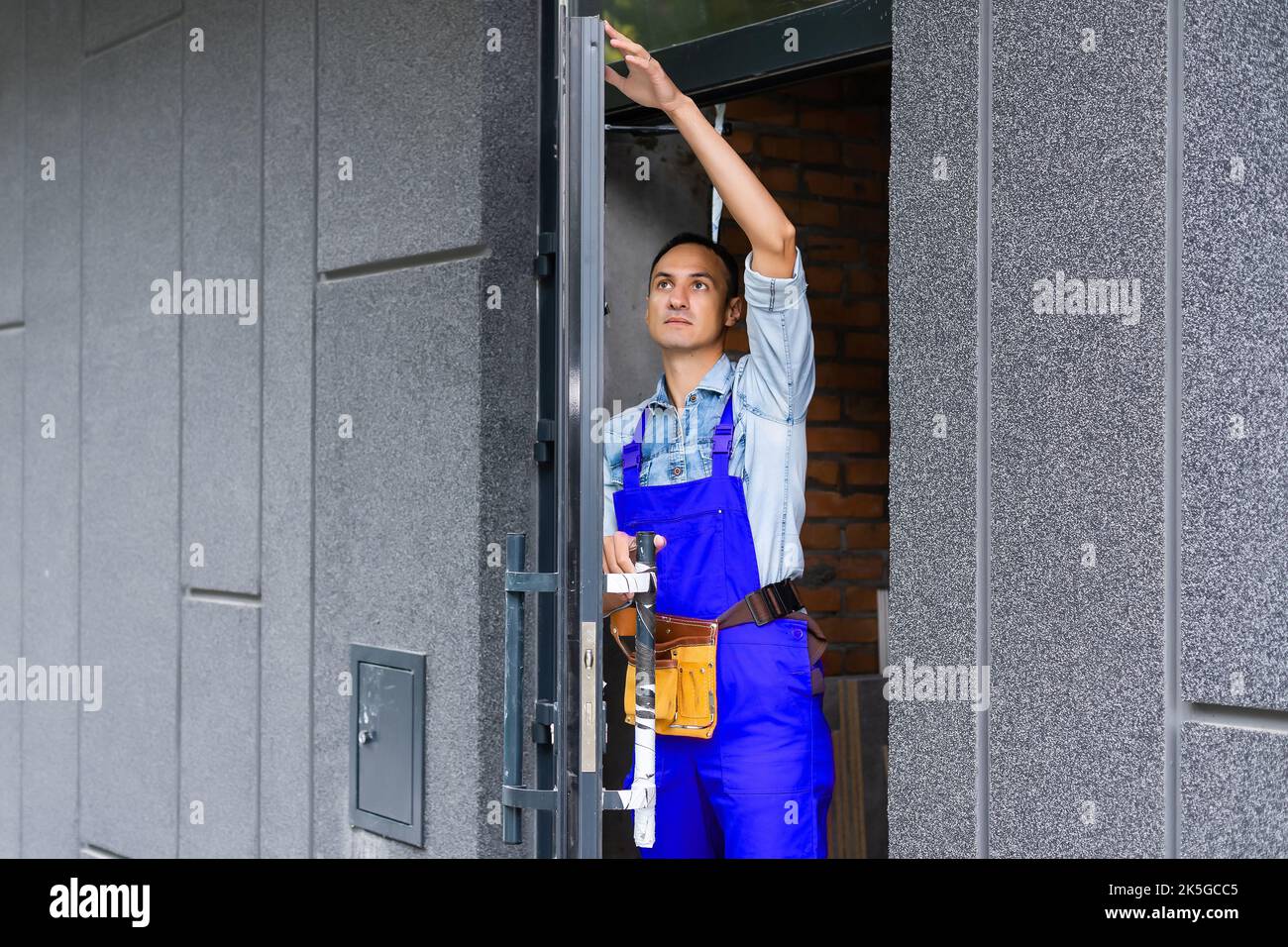 building, construction and people concept. Builder at construction ...